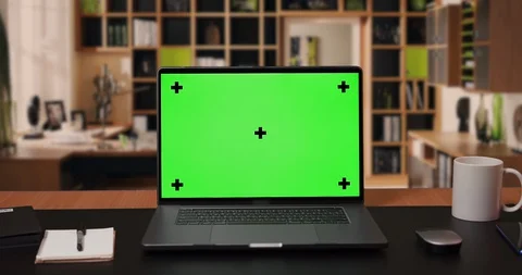Zoom in on laptop computer with Green sc... | Stock Video | Pond5