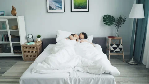 Zoom in of man and woman hugging talking... | Stock Video | Pond5