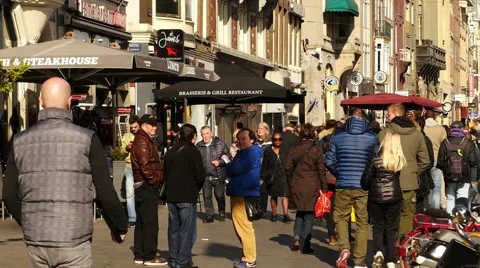 Zoom Out - Crowds of People Walking Down... | Stock Video | Pond5