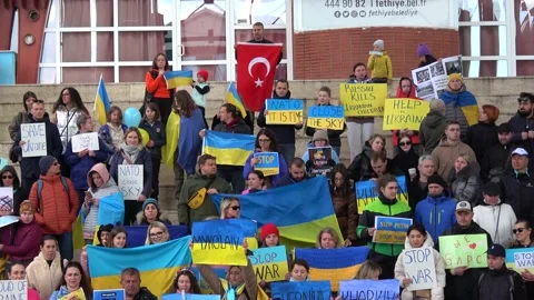 Zoom out group of people with posters on... | Stock Video | Pond5