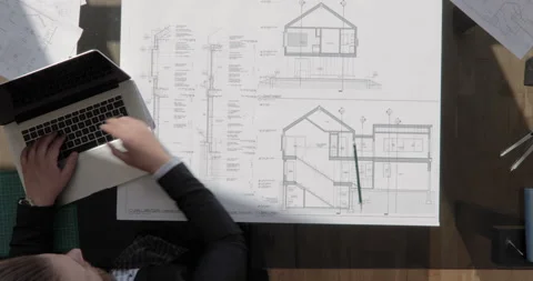 Zoom out top view shot of an architect h... | Stock Video | Pond5