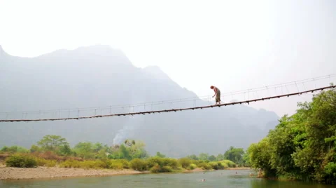Zoom, Pan, Tourist woman crossing danger... | Stock Video | Pond5