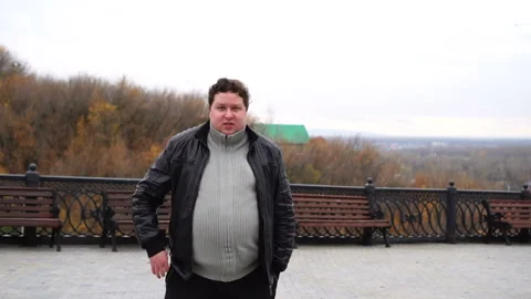 Zoom in portrait of fat angry man lookin... | Stock Video | Pond5