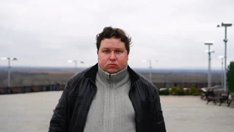 Zoom in Portrait of Fat Man Looking at C... | Stock Video | Pond5