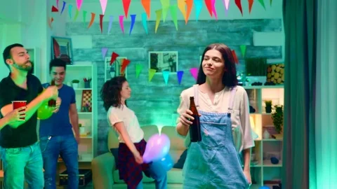 Zoom in shot of beautiful girl drinking ... | Stock Video | Pond5