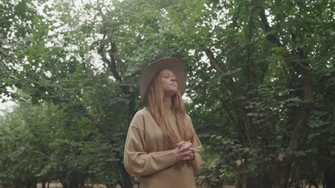 Zoom in shot of Caucasian Young Woman Pr... | Stock Video | Pond5