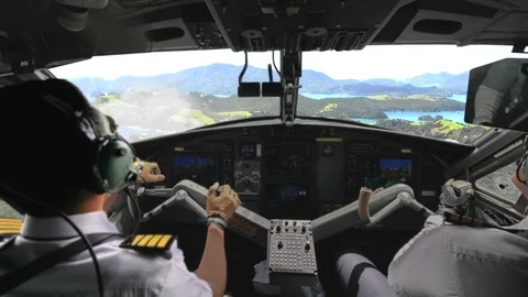 Zoom in view from the airplane cockpit c... | Stock Video | Pond5