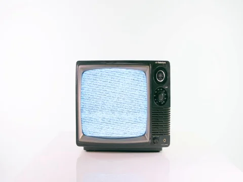 Zoom in on vintage TV playing static on ... | Stock Video | Pond5