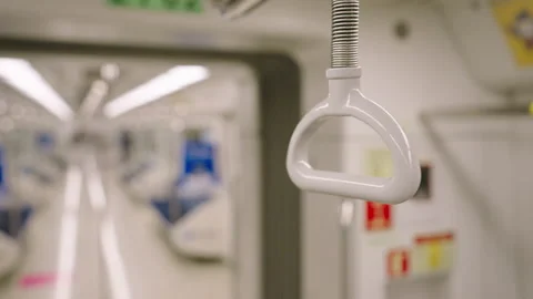 Zooming to the hand holder in the subway... | Stock Video | Pond5