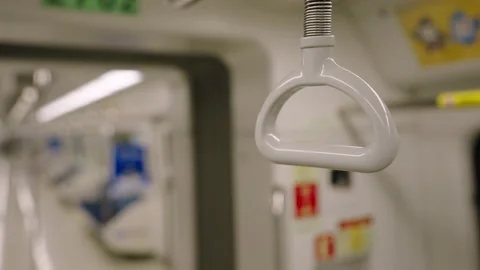 Zooming to the hand holder in the subway... | Stock Video | Pond5