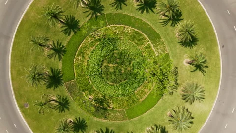 Zooming out of a green roundabout in Vie... | Stock Video | Pond5