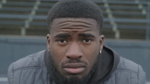 Zooming in shot of serious young black m... | Stock Video | Pond5