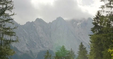 The Zugspitze shrouded in clouds. The wh... | Stock Video | Pond5